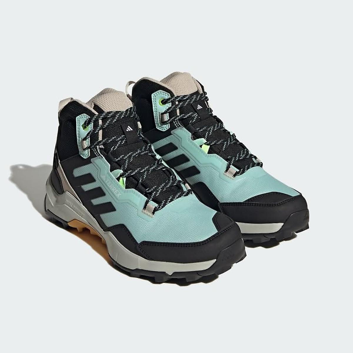 adidas Women's Terrex AX4 Mid Gore-Tex Sneaker, Semi Flash Aqua/Core Black/Preloved Yellow, 11
