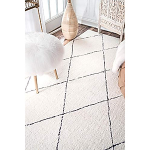nuLOOM Hand Tufted Armitra Area Rug, 6' 7" x 9', Natural