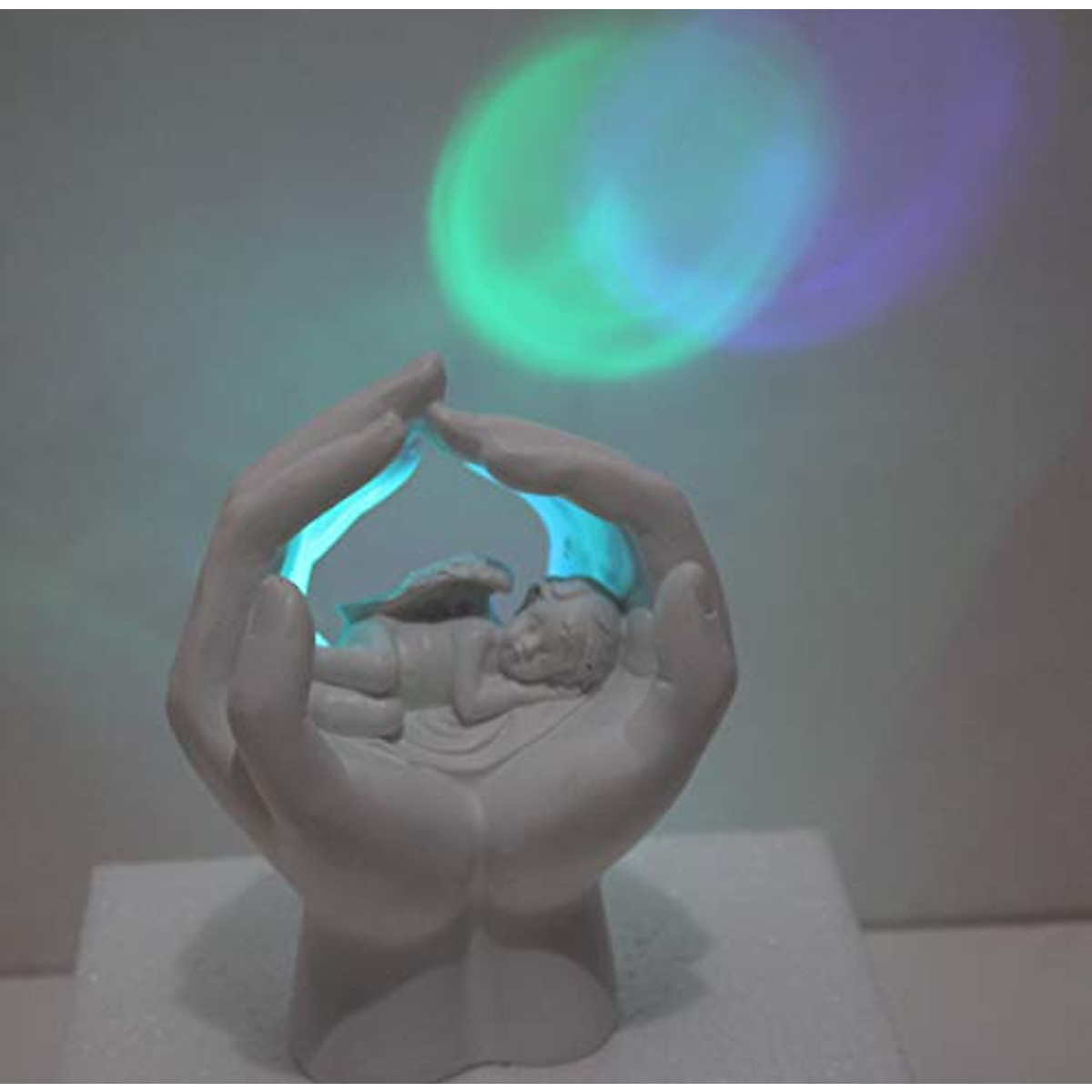 JUNIQUTE Sleeping Resting Angel in God's Hand with Colorful Light Fairy Garden Deco Cupid Statue Home Deco Cherub Statue Baby Sculpture Figurine Memorial