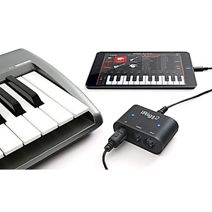 IK Multimedia iRig MIDI 2 universal MIDI interface with In, Out, and THRU ports, activity indicators for iPhone, iPad, Android, Mac, PC