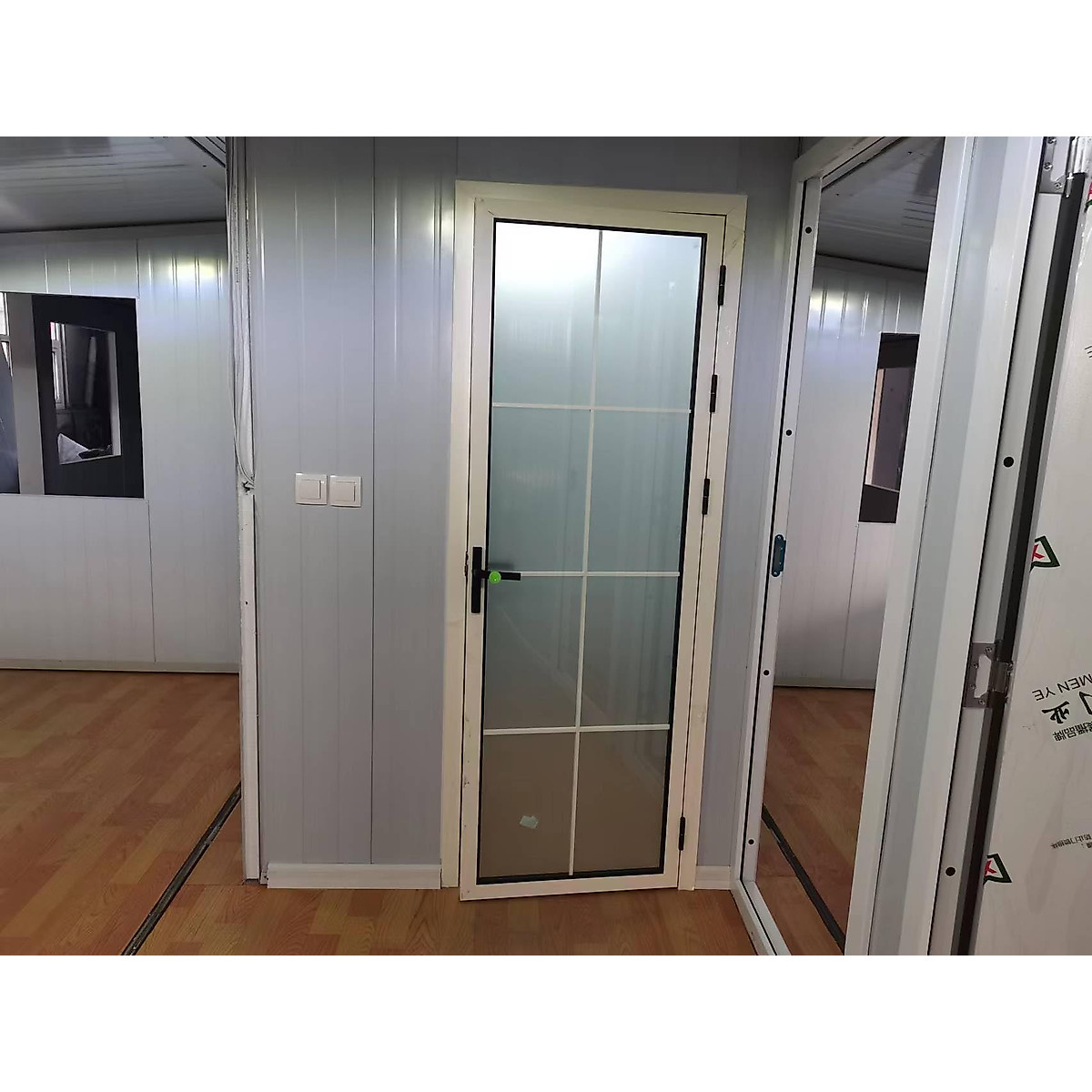 Prefabricated Modular Home with 2 Bedrooms, 1 Kitchen with Well furnished, 1 Bathroom with Exhaust Fan, 1 Living Room with Windows and Glass Doors, Sections