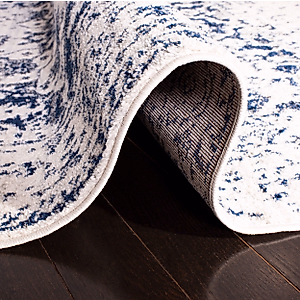 SAFAVIEH Madison Collection Area Rug - 6'7" x 9'2", Cream & Navy, Snowflake Medallion Distressed Design, Non-Shedding & Easy Care, Ideal for High Traffic Areas in Living Room, Bedroom (MAD603D)