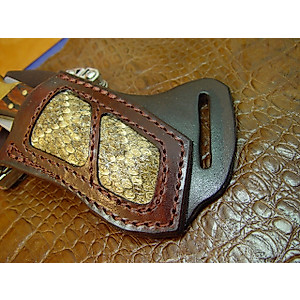 Buck 110 Rattlesnake Right-hand Cross Draw Knife Sheath. The Sheath Is Made Out of 10 Ounce Water Buffalo Leather and a Rattlesnake Insert. It is Made to Wear on Your Left-Side and Drawn with Your Right Hand the Sheath Is Dyed Dark Brown. Sheath Only the