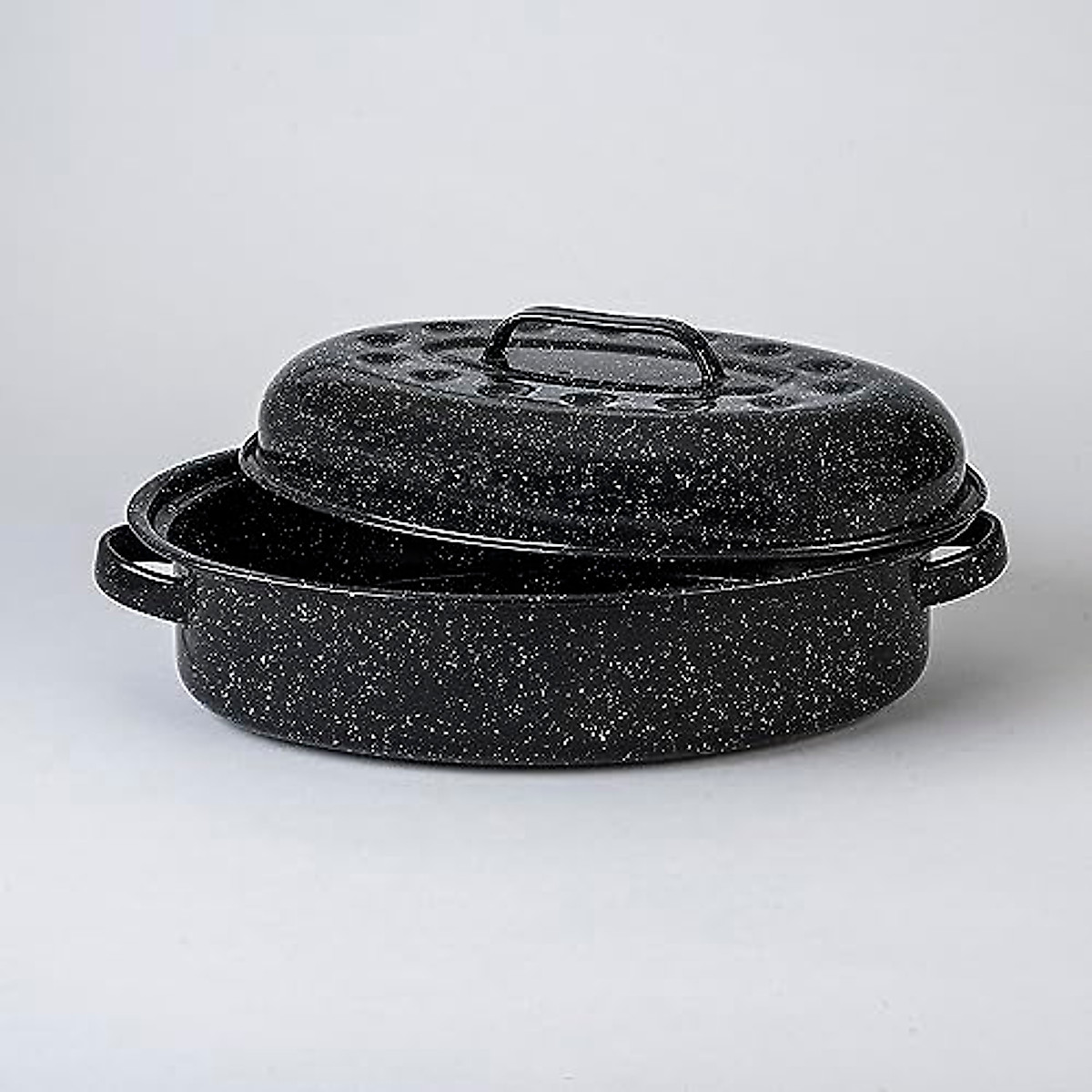 Granite Ware Roasting Set Covered 13 in and 15 in Oval roaster and 3 lb round roaster. Enameled Steel design to accomodate up to 7 lb and 10 lb poultry/roast. Resists up to 932°F.