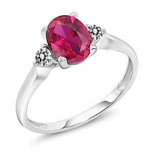Gem Stone King 10K White Gold Oval Red Created Ruby and White Diamond Engagement Ring For Women (1.63 Cttw, Available In Size 5, 6, 7, 8, 9)