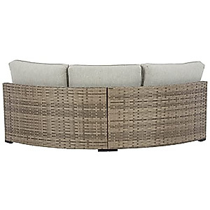 Signature Design by Ashley Outdoor Calworth Curved Patio Wicker Loveseat with Cushion, Beige