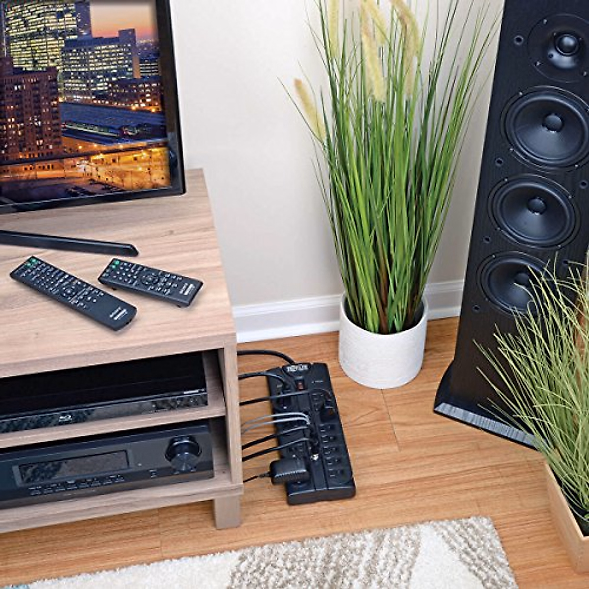 Tripp Lite TLP1208TELTV 12 Outlet Surge Protector Power Strip, 8ft Cord, Right-Angle Plug, Tel/Modem/Coax Protection, RJ11, & Dollar 150,000 Insurance Black