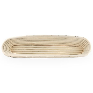 The Lucky Clover Trading Artisan Collection Slim Proofing Basket, 15" x 3.75" x 2.5" at top Rim. Base Dimensions are 13" Long by 2" Wide, Natural Rattan