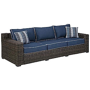 Signature Design by Ashley Grasson Lane Outdoor Patio Wicker Sofa with Cushion and 2 Pillows, Brown & Blue