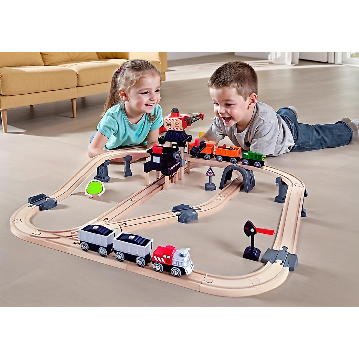Hape Crane and Cargo Train Set | Wooden Railway Toy Set with Magnetic Crane, Button Operated Loader and Adjustable Rail Signal