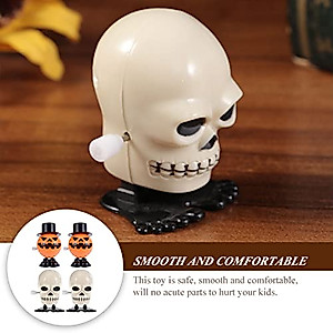 TOYANDONA 24pcs Small Gift Goodie Pumpkin Kids, Up Wind- Goodies Wind Walking Head Stuffers Toys Fillers Clockwork and Jumping Jack Party Favors Funny Halloween Toy Novelty Supplies Bag