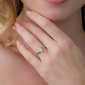 925 Sterling Silver and 10K Yellow Gold Forever Classic Moissanite from Charles & Colvard Women Solitaire Ring (0.58 Cttw, Emerald Cut 6X4MM, Available in size 5, 6, 7, 8, 9)