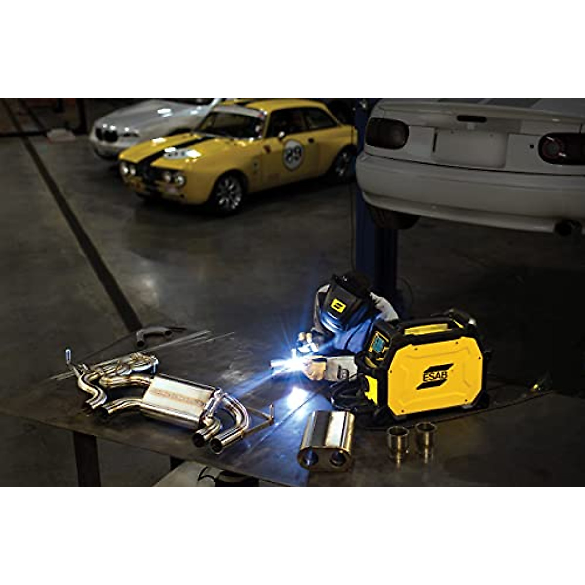 ESAB 0558102240 Rebel EMP 215IC Multi-Process MIG/TIG/Flux/Stick Welding System, sMIG Technology, 4.3" Screen, Victor Gas Regulator, TWECO Fusion 180 MIG Gun, TIG Torch and Electrode Holder