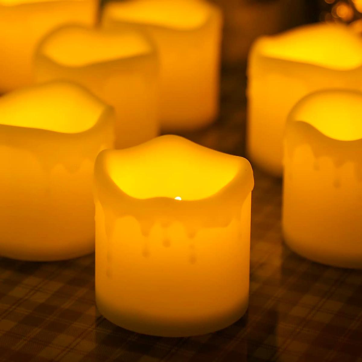 Furora LIGHTING Ivory Melting Style LED Votive Candles Pack of 12, Realistic Flickering Flame for Home and Party Décor, 2’’(W) x 2’’(H), Battery Operated