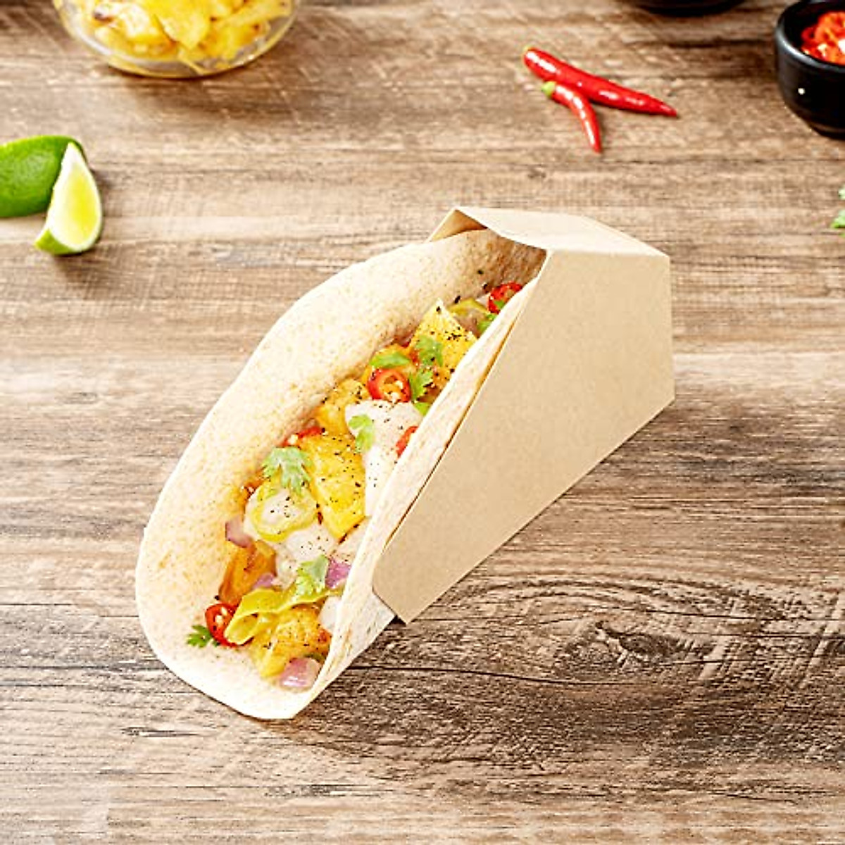 Restaurantware Bio Tek 6 .25 x 2 x 3.75 Inch Single Taco Holder 200 Greaseproof Stand Up Taco Holder - Large Self-Standing Kraft Paper Paper Taco Holder Freezable
