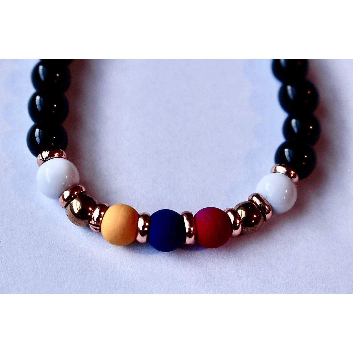 CharmsOfTheWorld Handmade Bracelet from Medellin - Colombia Flag Colors - Cat's eye gemstone and steel beads - Sliding Knot