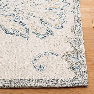 SAFAVIEH Micro-Loop Collection Area Rug - 5' x 8', Ivory & Blue, Handmade Floral Wool, Ideal for High Traffic Areas in Living Room, Bedroom (MLP477A)
