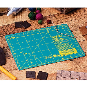 OLFA 6" x 8" Self Healing Rotary Cutting Mat (RM-6x8) - Double Sided 6x8 Inch Cutting Mat with Grid for Quilting, Sewing, Fabric, & Crafts, Designed for Use with Rotary Cutters (Green)