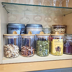 Set of 4 Airtight Glass Jars with Bamboo Lids and Spoons - 20oz Decorative and Durable Borosilicate Glass Canisters Perfect for Storing Coffee Beans,Tea,Flour,Sugar,Nuts,Candy,Bath Salts and More