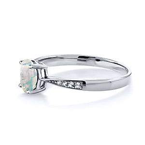 Gem Stone King 10K White Gold White Opal and White Diamond Engagement Ring For Women (0.69 Cttw, Gemstone October Birthstone, Oval Cabochon 7X5MM, Available In Size 5, 6, 7, 8, 9)