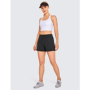 CRZ YOGA Women's Lightweight Mid Rise Hiking Shorts 4'' - Stretch Athletic Summer Travel Outdoor Golf Shorts Zip Pockets Ink Gray Medium