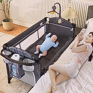 5-in-1 Baby Bedside Sleeper with Bassinet, Multifunction Bedside Baby Crib from Newborn to Toddlers, U-Shaped Diaper Changer, Safety Strap, Music Box & Hanging Toys, Baby Playard Deluxe Nursery Center