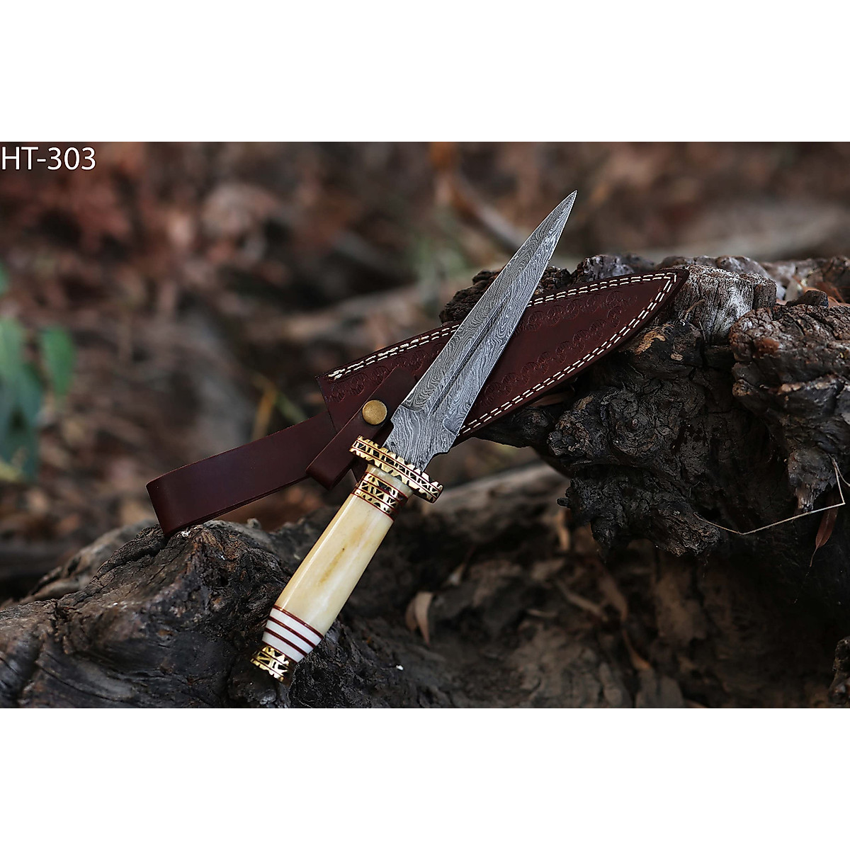 12.5 Inch long Hunting knife, Collectible knife, Natural Camel bone scale embellished with engraved brass finger guard, foil work spacer and pommel, Hand forged Twist pattern Damascus steel blade, Comes with Leather sheath