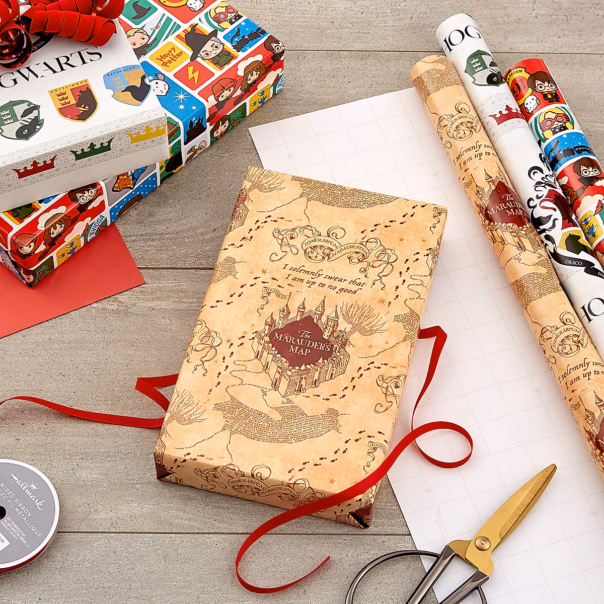 Hallmark Harry Potter Wrapping Paper with Cut Lines on Reverse (3-Pack: 60 sq. ft. ttl; Marauder's Map, Hogwarts Crest) for Birthdays, Graduations, Christmas, Valentine's Day