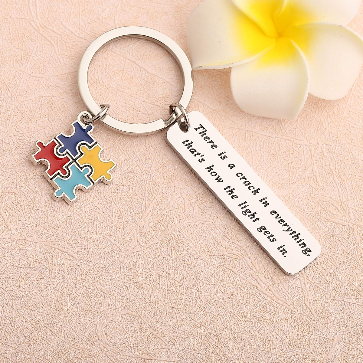 FUSTMW Autism Awareness Keychain Gift Puzzle Piece Charm Autism Mom Inspirational Gift for Autistic Teen There is a crack in everything that is how the light gets in (silver)