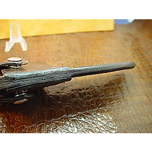 Custom-made Cross Draw Knife Sheath for the Buck Kalinga 401 Knife. The Sheath Is Made Out of 10 Ounce Water Buffalo Hide Leather. The 10 oz. Leather is Dyed Dark Brown. The Sheath Also Has a Strap for Extra Security of Your Knife From Falling Out. The Sh