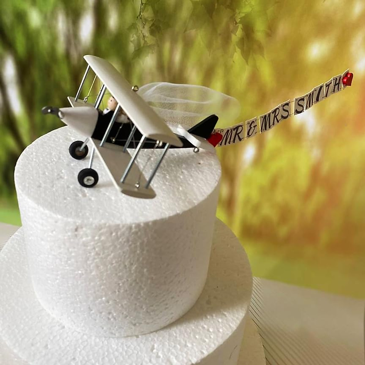 Airplane Wedding Cake Topper with Custom banner Mr. & Mrs. Cute unique honeymoon figurines at the helm of the plane