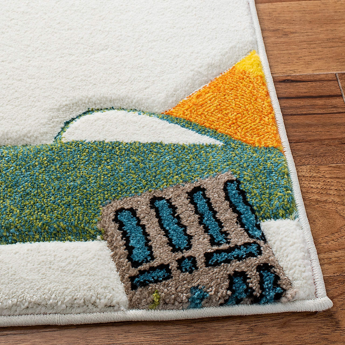 SAFAVIEH Carousel Kids Collection Area Rug - 8' x 10', Ivory & Blue, Non-Shedding & Easy Care, Ideal for High Traffic Areas for Boys & Girls in Playroom, Nursery, Bedroom (CRK167A)