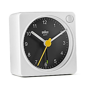Braun Classic Travel Analogue Alarm Clock with Snooze and Light, Compact Size, Quiet Quartz Movement, Crescendo Beep Alarm in White and Black, Model BC02XWB.