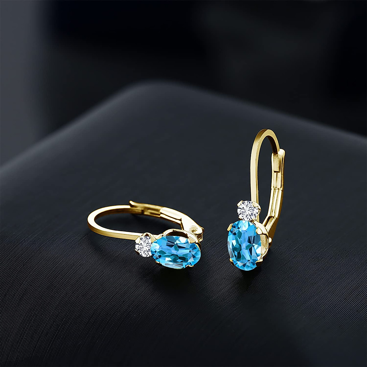 Gem Stone King 14K Yellow Gold Swiss Blue Topaz and White Diamond Leverback Earrings For Women | 1.07 Cttw | Gemstone November Birthstone | Oval 6X4MM, Round 2MM | 3/4 Inch