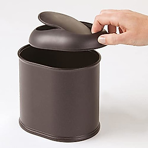 mDesign Modern Plastic Mini Wastebasket Trash Can Dispenser with Swing Lid for Bathroom Vanity Countertop or Tabletop - Dispose of Cotton Rounds, Makeup Sponges, Tissues - Bronze