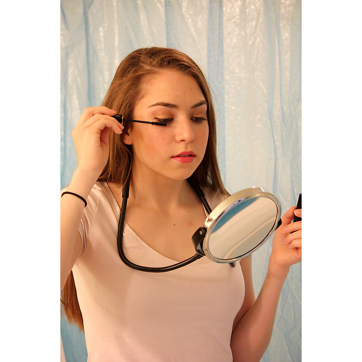 "The Mirrorcle" Great for viewing back of head, traveling, makeup, cutting hair. Cushioned cable is new for comfort to contour to your neck. Std viewing 1 side & 5X on opposite side.