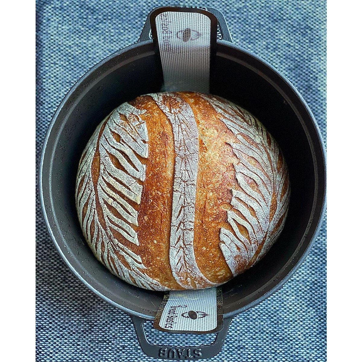 Bread Basics Silicone Baking Mat for Dutch Oven Bread Baking w/Storage Band - Long Handles for Gentler & Safer Transfer of Dough - Easy to Clean - Eco-Friendly Alternative for Parchment Paper - 8.3"