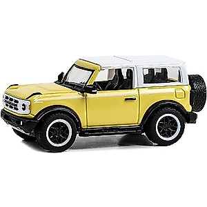 2023 Bronco Heritage Edition Yellowstone Metallic with Oxford White Top Showroom Floor Series 3 1/64 Diecast Model Car by Greenlight 68030D