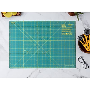 OLFA 17" x 24" Folding Cutting Mat (FCM-17x24) - Self Healing 17x24 Inch Foldable Rotary Mat with Grid for Quilting, Sewing, Fabric & Crafts, Use with Rotary Cutters & Fixed Blade Knives (Green)