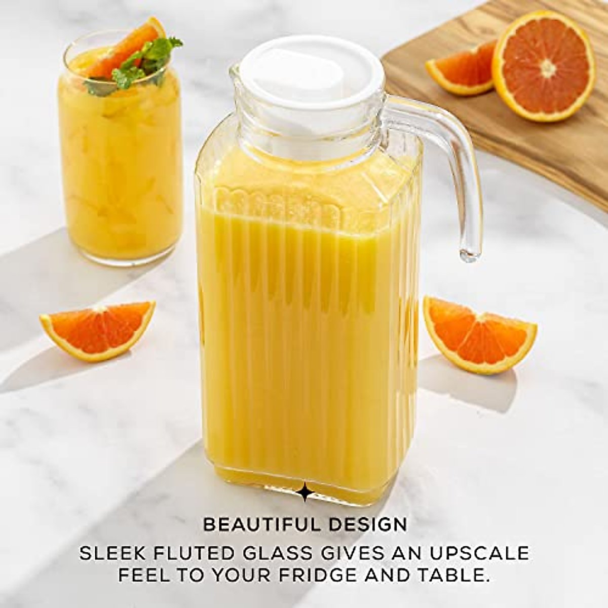 JoyJolt 60oz Glass Pitcher with Lid (2 Lids) - Beverage Serveware and Storage Container for Hot Liquids or Cold Drinks. Fridge Pitcher, Juice Container, Water Jug, Iced Tea Pitcher or Milk Pitcher