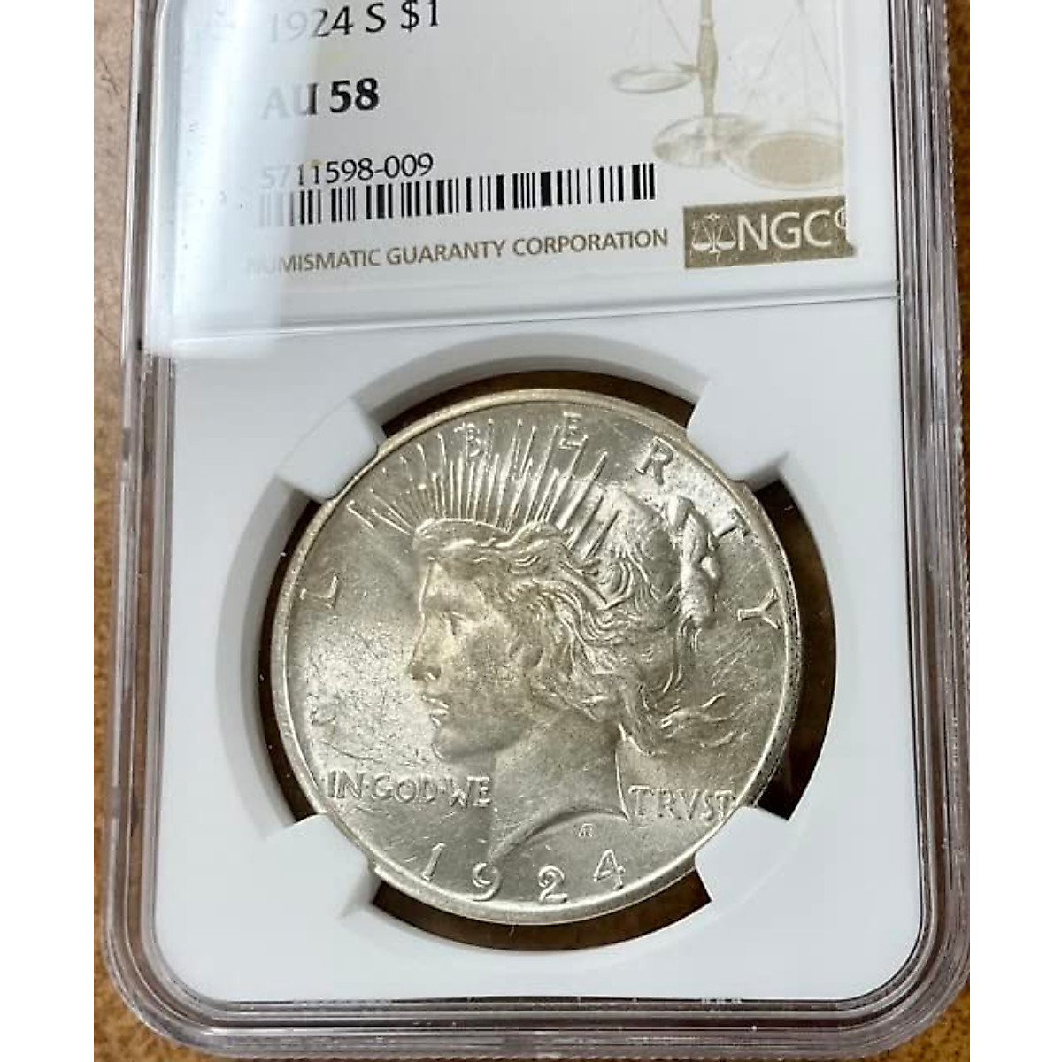 1924 S Peace Dollar $1 NGC AU-58