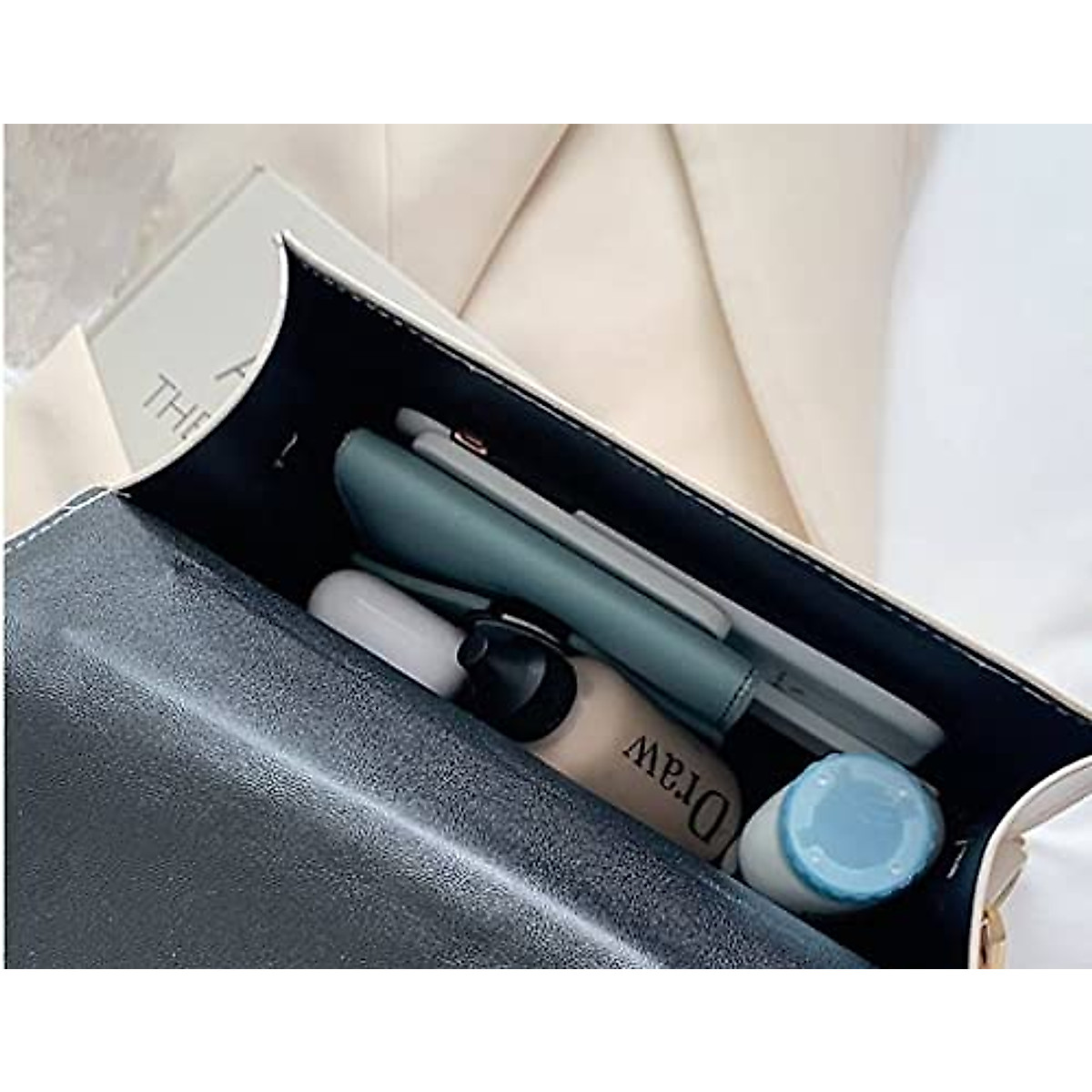 Ladies crossbody leather handbag in three classic colors with a creative geometric design and a small buckle chain closure.  (White)