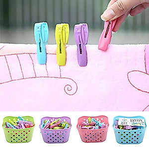 Goeielewe 30 Pcs Plastic Clothespins Clothing Clips Pegs with Storage Basket, Multifunction Windproof Clothing Towel Clips for Clothesline Hangers (Purple)