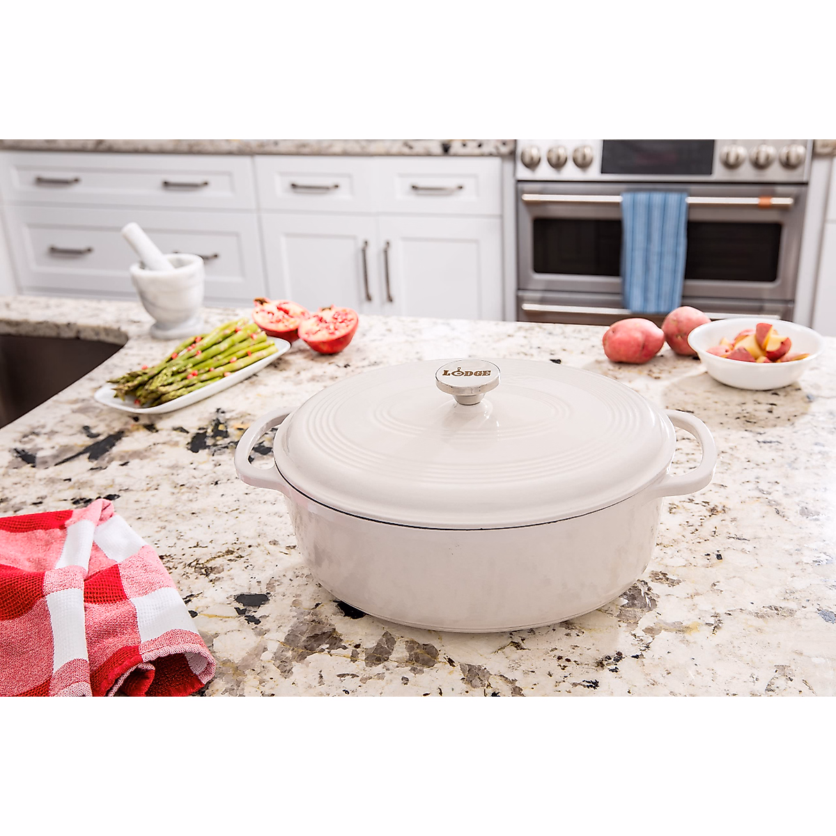Lodge 7 Quart Enameled Cast Iron Oval Dutch Oven with Lid – Dual Handles – Oven Safe up to 500° F or on Stovetop - Use to Marinate, Cook, Bake, Refrigerate and Serve – Oyster White