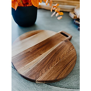 Round charcuterie serving board with handle, handmade in the USA with Walnut hardwood.