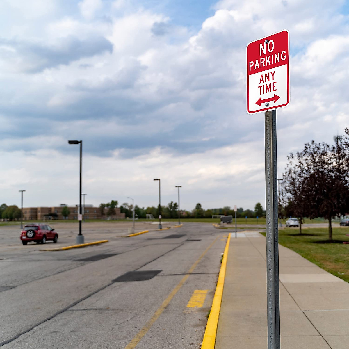 SmartSign 18 x 12 inch “No Parking - Any Time” Metal Sign with Bidirectional Arrow, 63 mil Aluminum, 3M Laminated Engineer Grade Reflective Material, Red and White, Made in USA