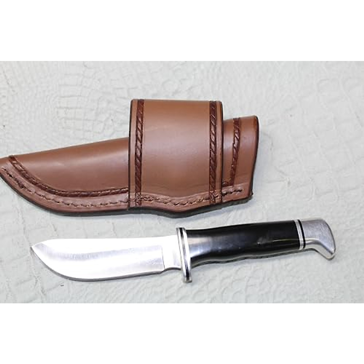 CARL THOMAS LEATHERS Crossdraw knife sheath. quality leather quality stitching. fix blade Nylon stitching. may defeat a 103. Knife holder.