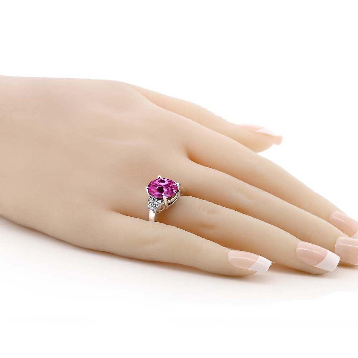 Gem Stone King 925 Sterling Silver Pink Created Sapphire Ring For Women (6.30 Cttw, Oval 12X10MM, Available 5,6,7,8,9) (Size 6)
