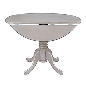 International Concepts 42" Round Dual Drop Leaf Pedestal Table, Washed Gray Taupe