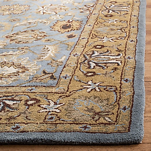 SAFAVIEH Heritage Collection Area Rug - 9'6" x 13'6", Blue & Gold, Handmade Traditional Oriental Wool, Ideal for High Traffic Areas in Living Room, Bedroom (HG958A)